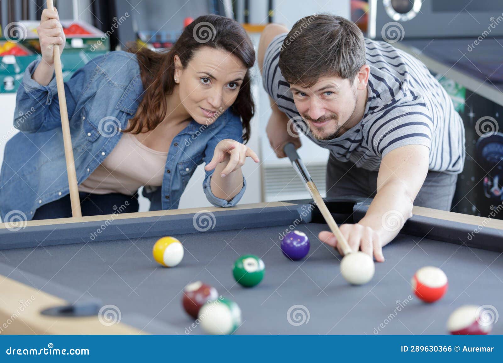 Young Couple Playing Snooker Together in Bar Stock Photo - Image of ...