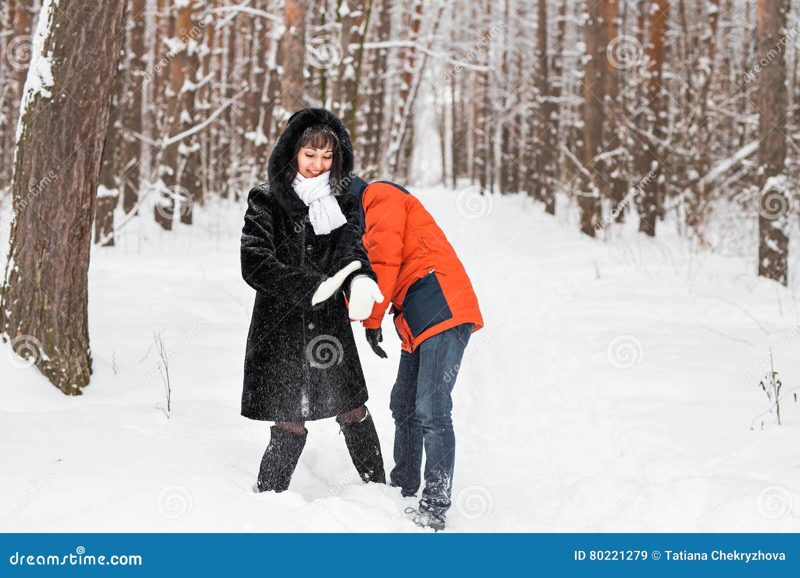 Young Couple Playing in Snow, Having Snowball Fight Stock Image - Image ...