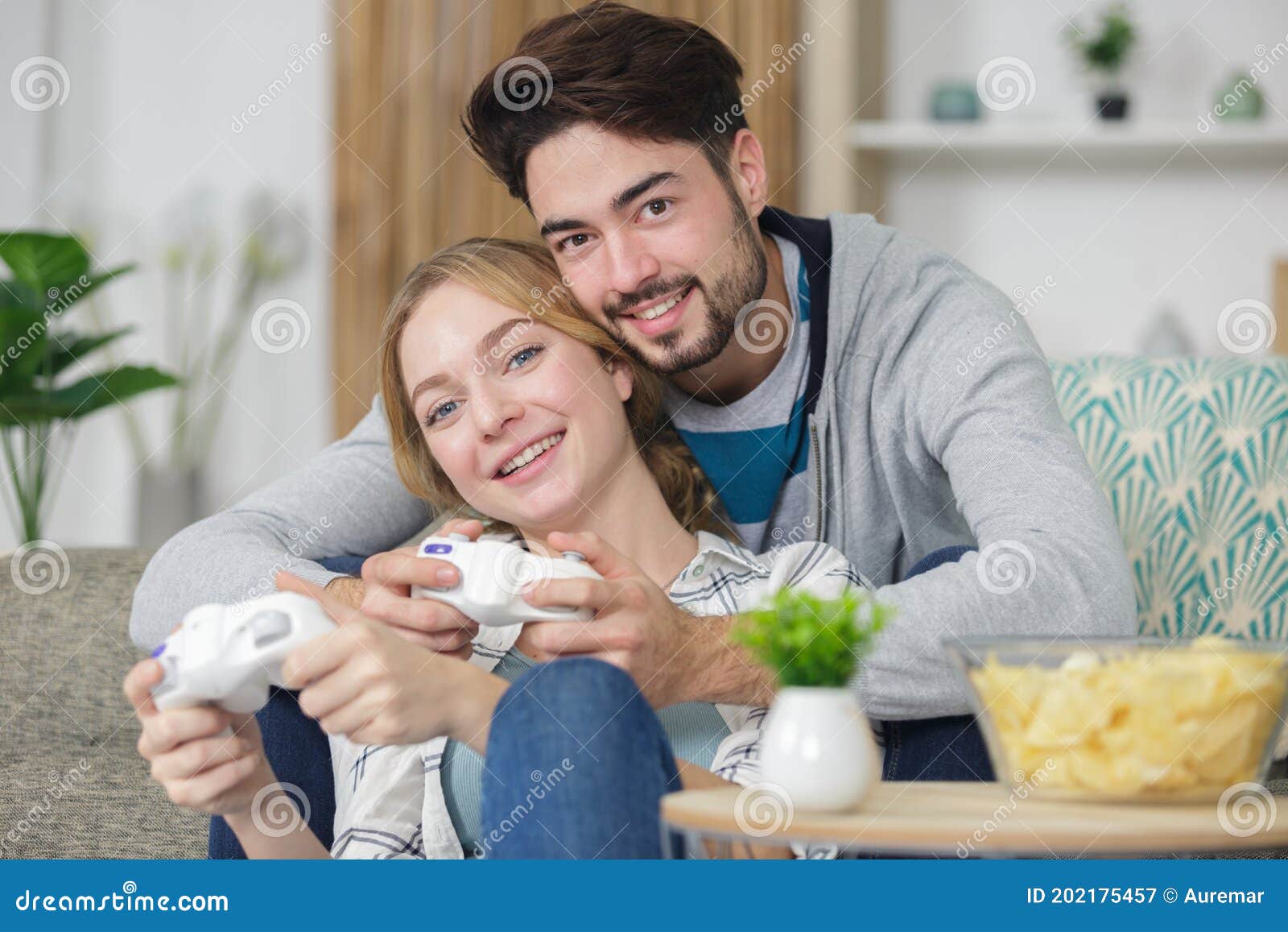 Young Couple Playing Video Games Stock Image - Image of cuddle ...
