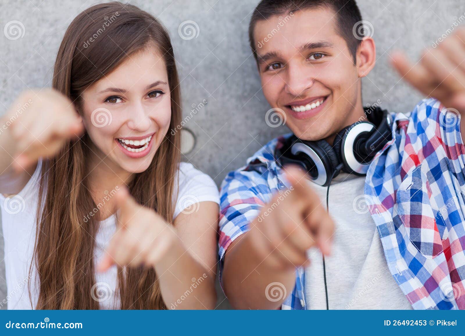 Young couple pointing stock image. Image of attractive - 26492453