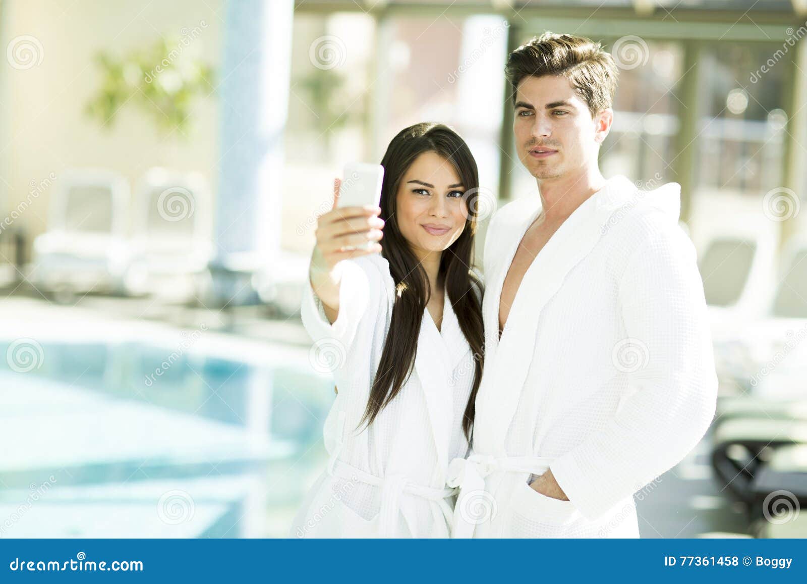 Young couple by the pool stock photo. Image of male, beauty - 77361458
