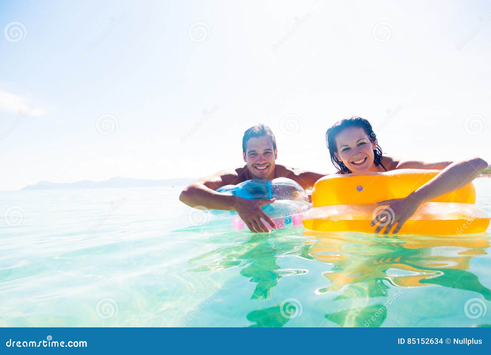 Young Couple with Pool Raft Stock Photo - Image of woman, male: 85152634