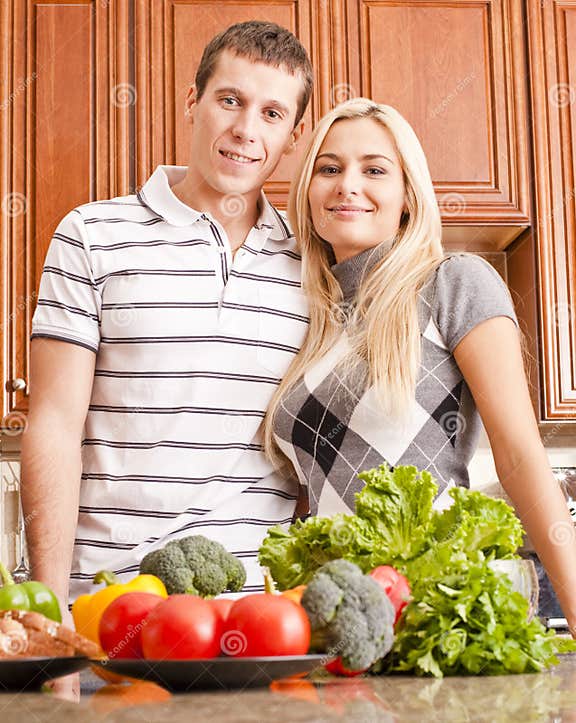 Young Couple Posing in Kitchen Stock Image - Image of handsome ...