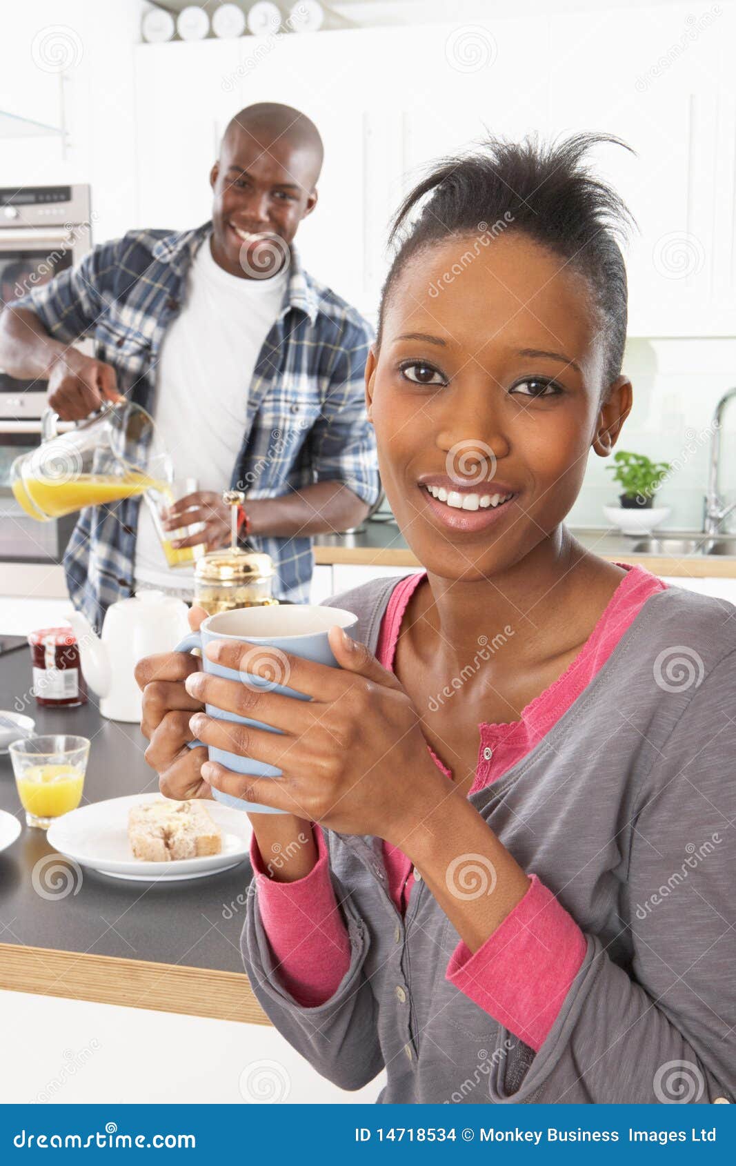 Young Couple Preparing Breakfast in Modern Kitchen Stock Photo - Image ...