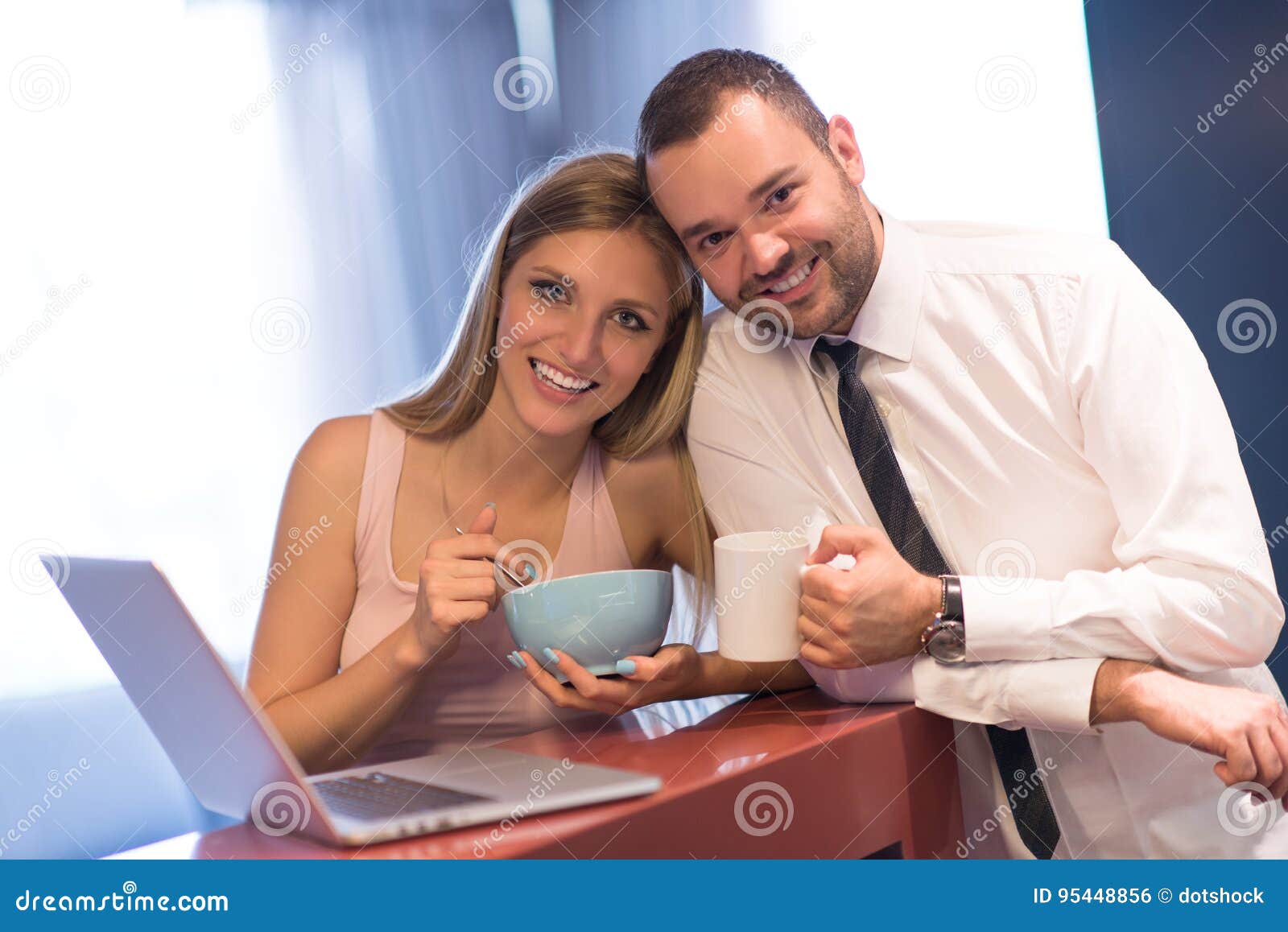A Young Couple is Preparing for a Job and Using a Laptop Stock Photo ... A Young Couple is Preparing for a Job and Using a Laptop Stock Photo ...