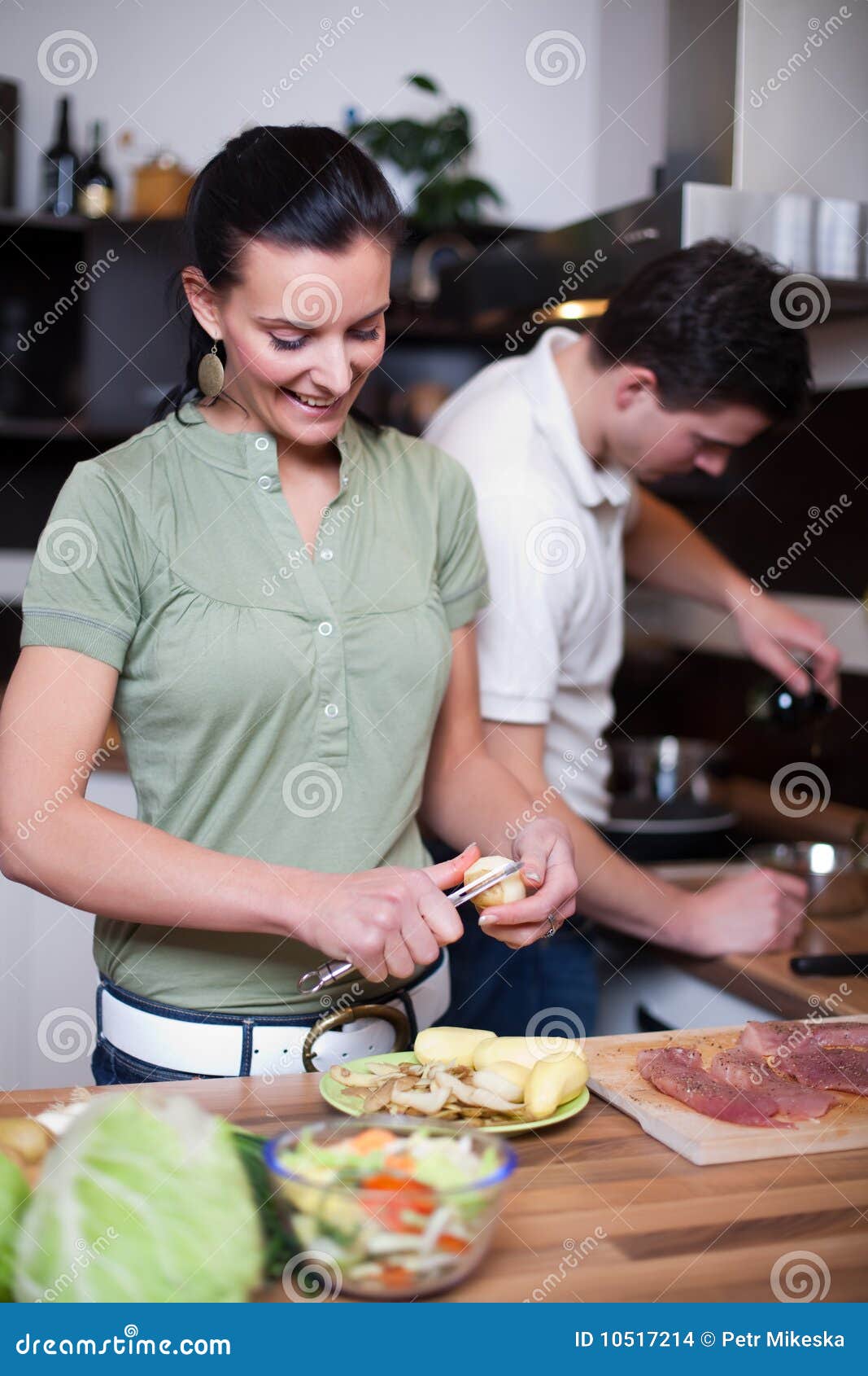 Young Couple Preparing Lunch Stock Photo - Image of beautiful ...