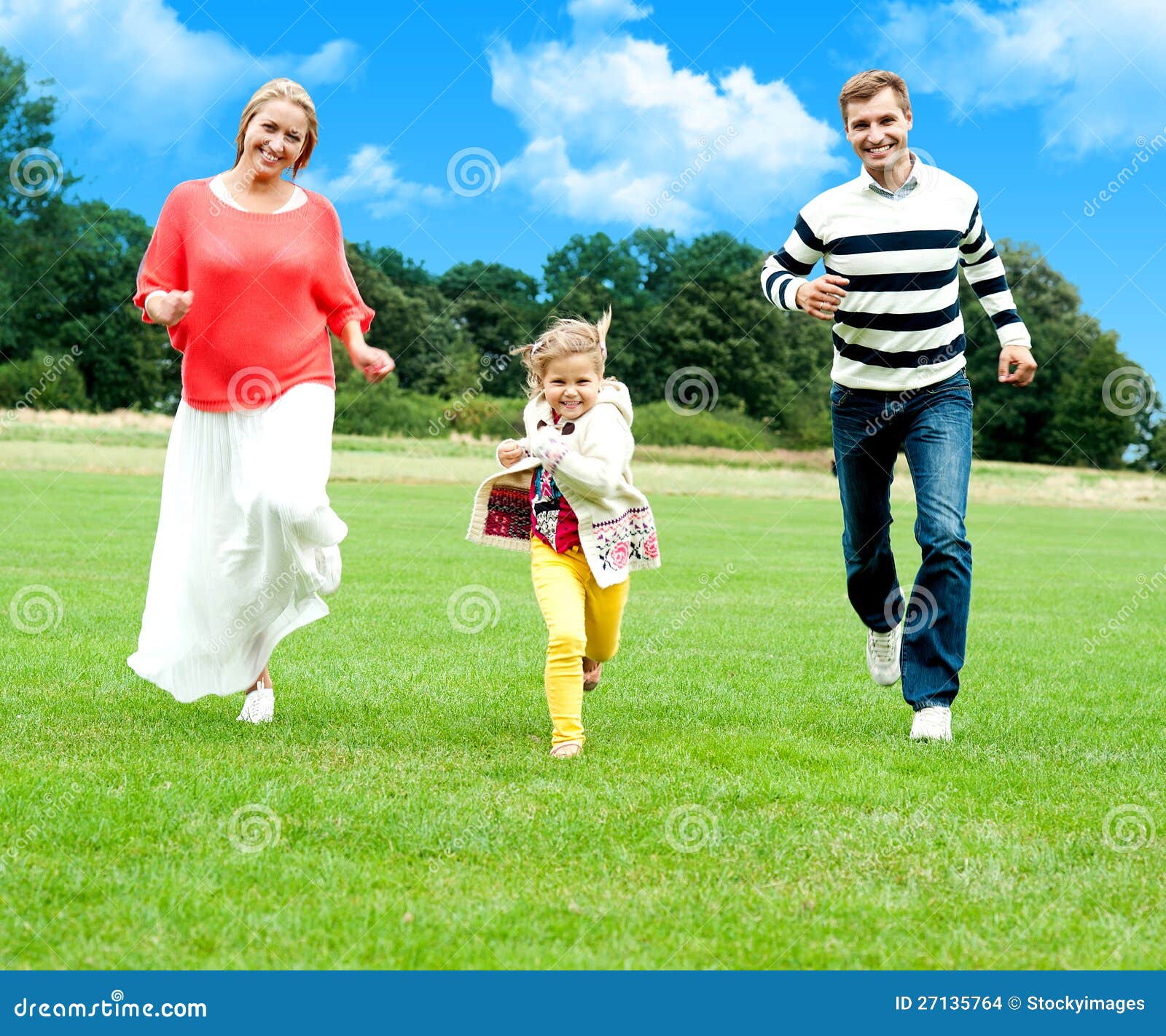 Young Couple Racing with Their Cute Daughter Stock Photo - Image of ...