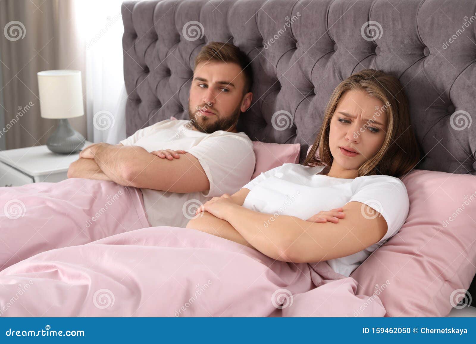 Young Couple with Relationship Problems in Bed Stock Photo - Image of ...