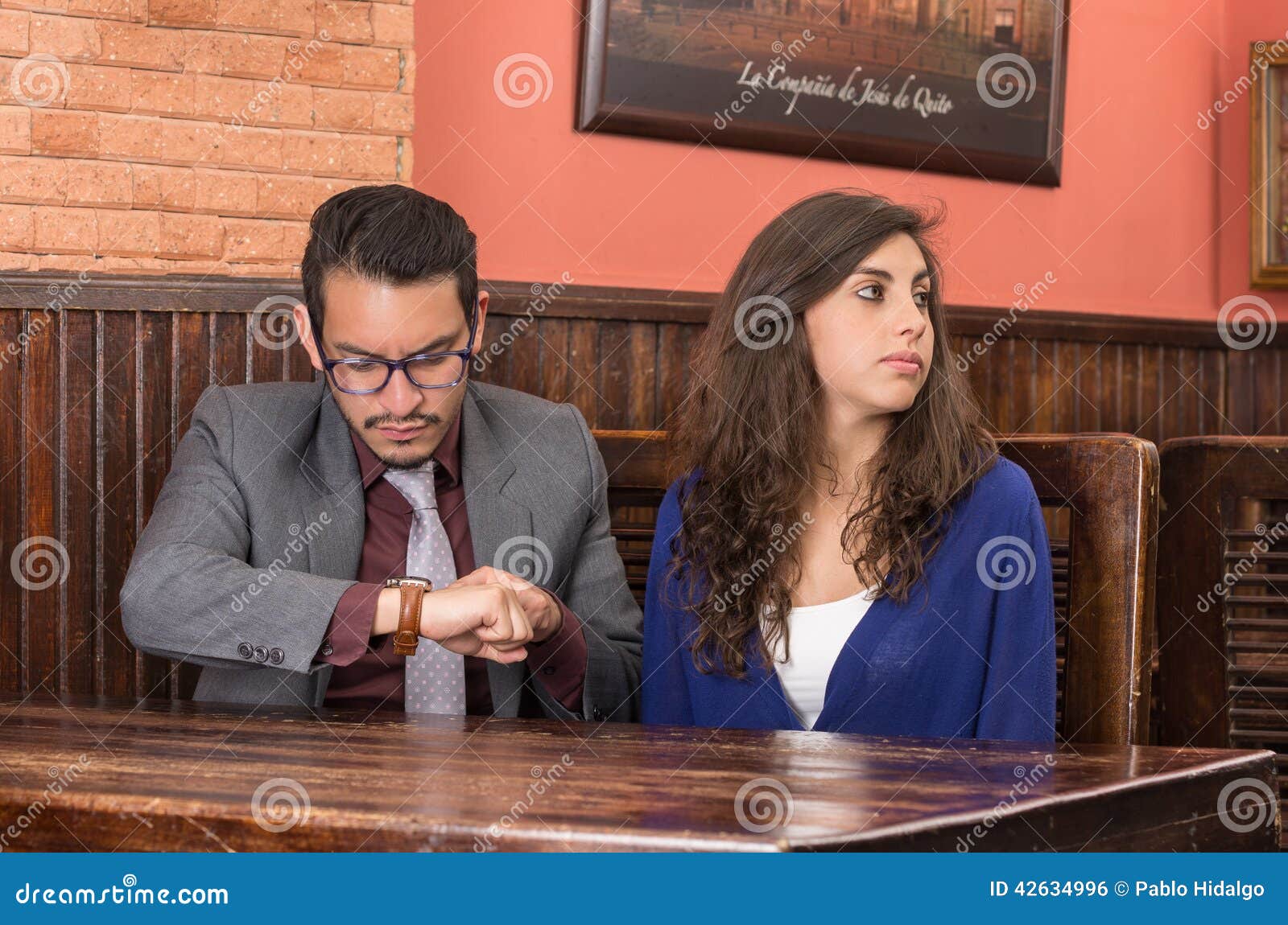 Young Couple in a Restaurant Stock Photo - Image of menu, date: 42634996