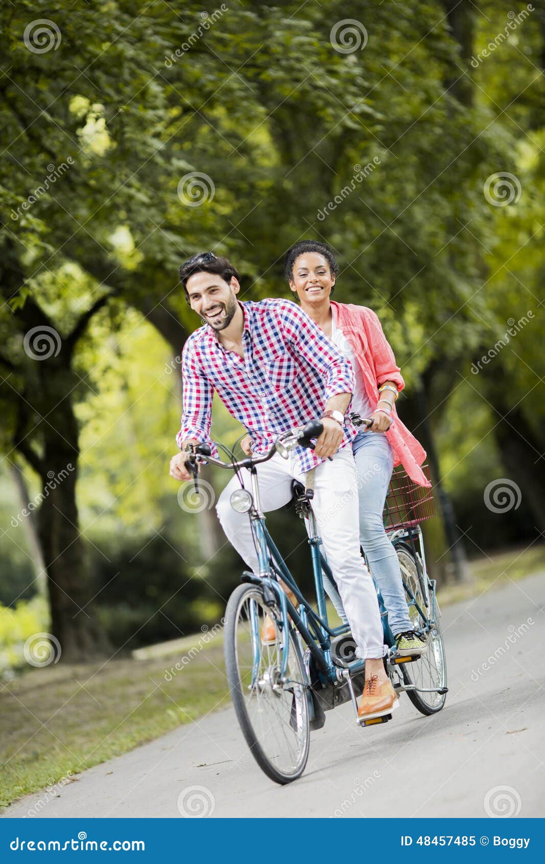 Young Couple Riding on the Tandem Bicycle Stock Image - Image of ...