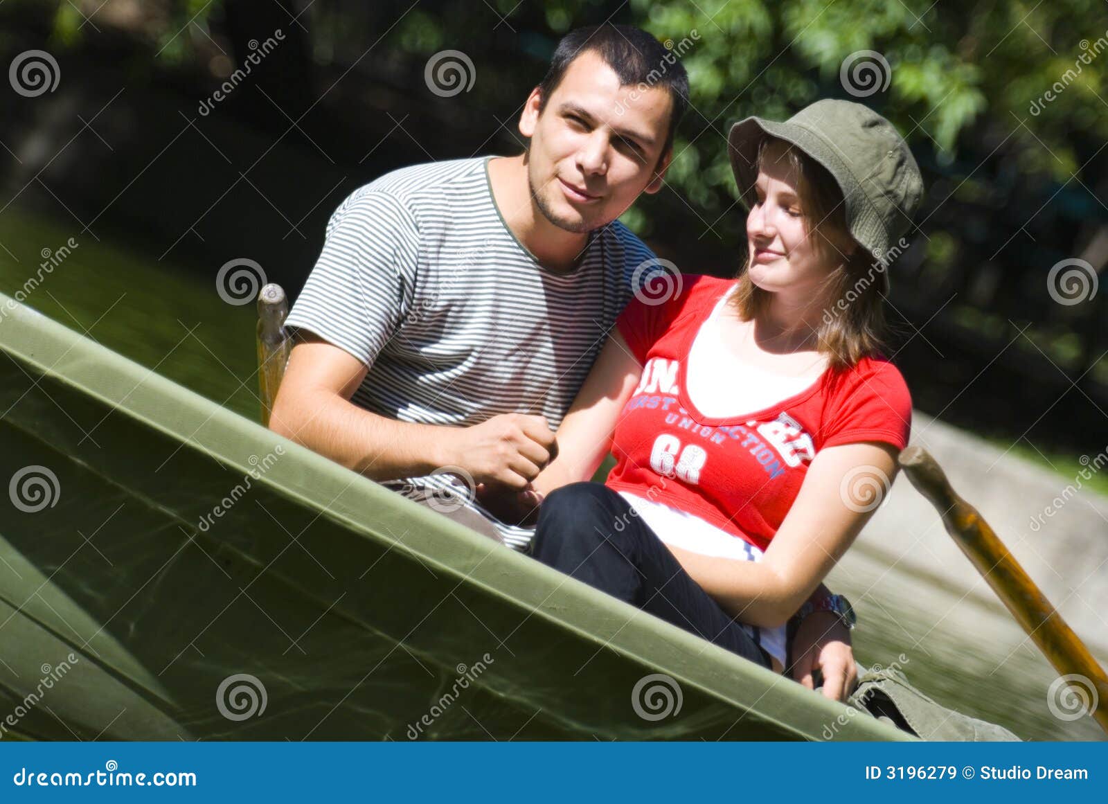 Young couple in rowboat stock image. Image of bright, love - 3196279