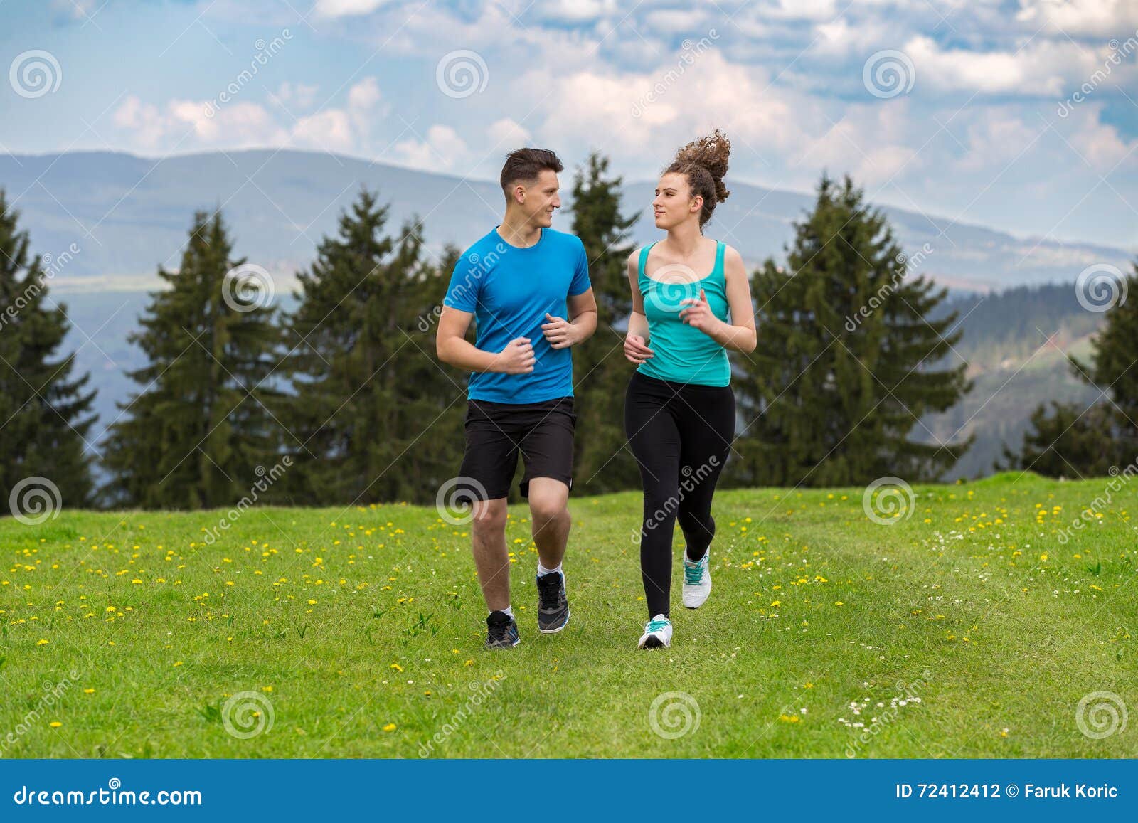 Young Couple Running in Nature Stock Photo - Image of outdoor, healthy ...