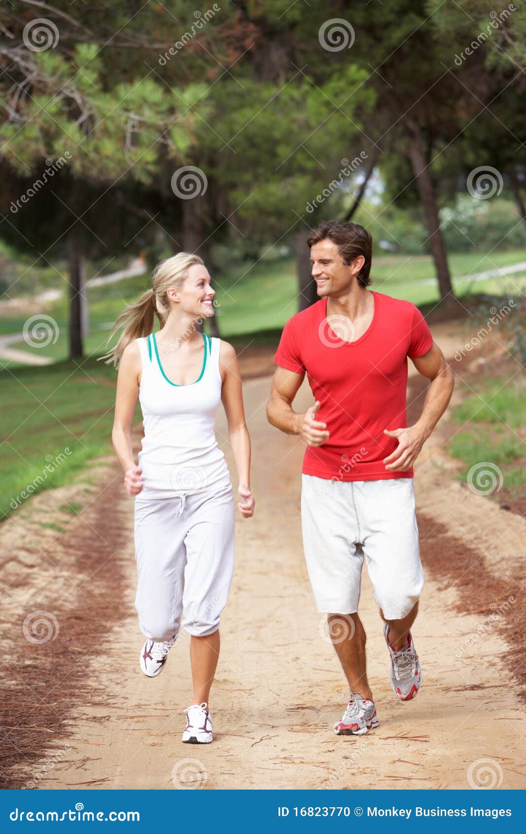 Young Couple Running in Park Stock Photo - Image of lifestyle, people ...
