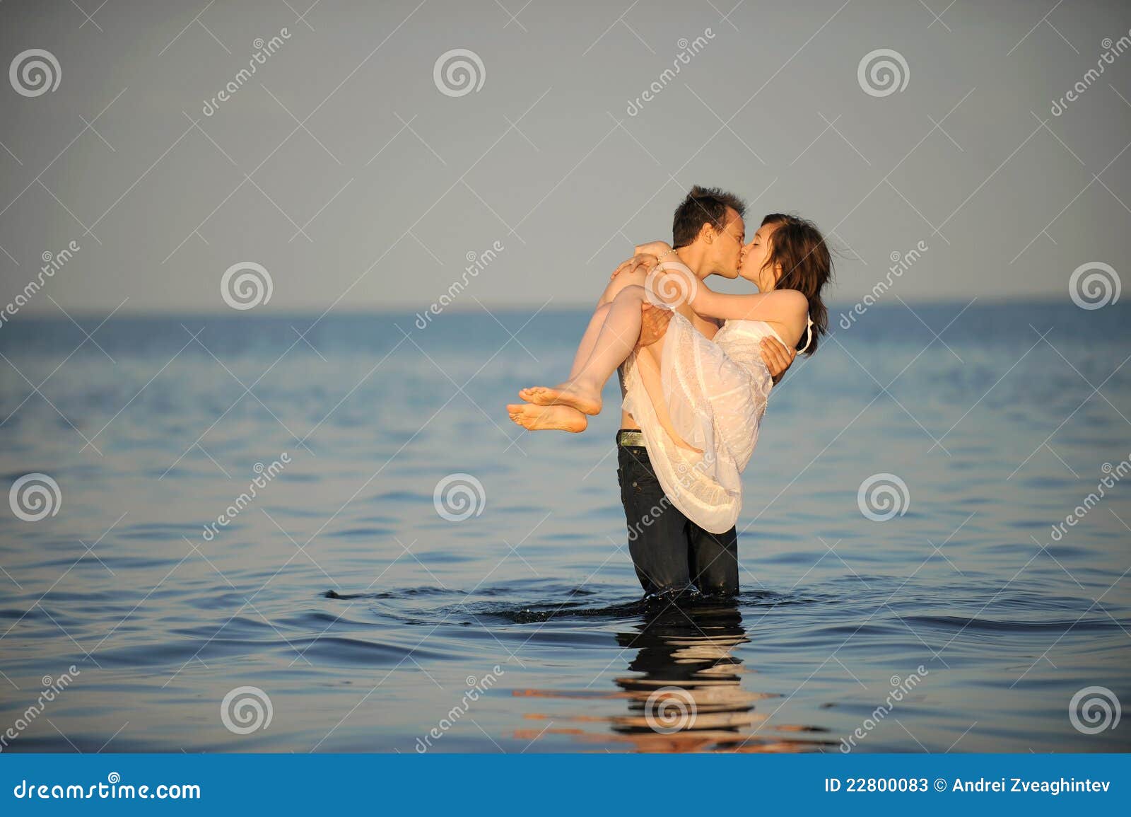 Young couple in the sea stock image. Image of love, happy - 22800083