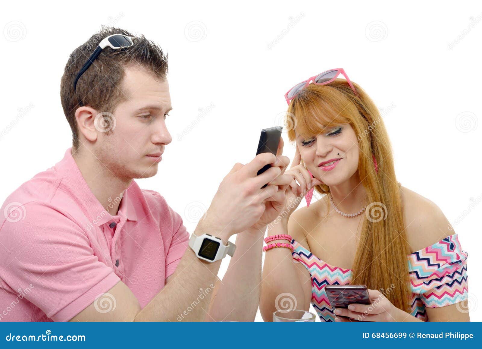 Young Couple Sending Text Messages on Their Phones Stock Image - Image ...