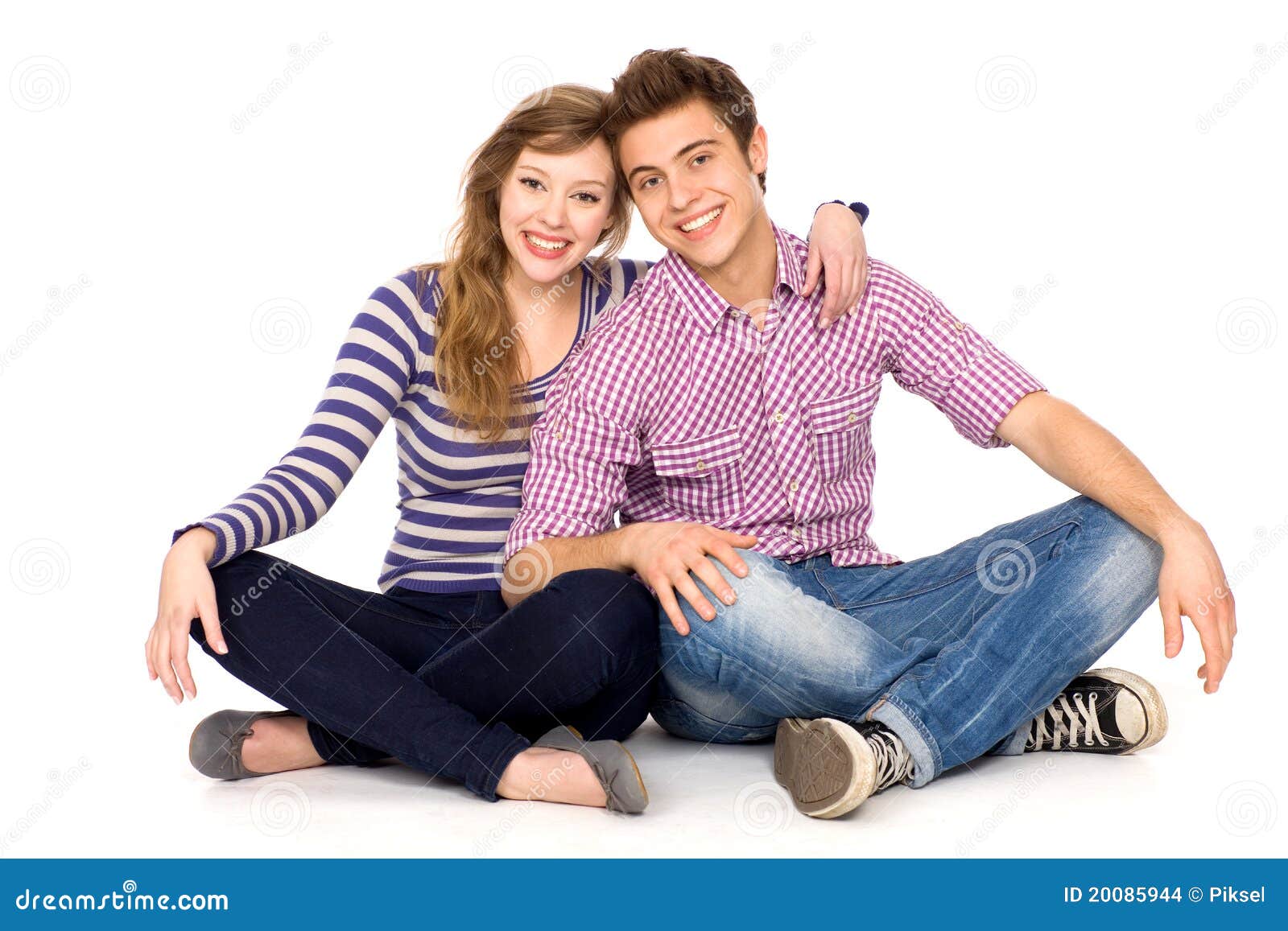Young couple sitting stock photo. Image of people, embracing - 20085944