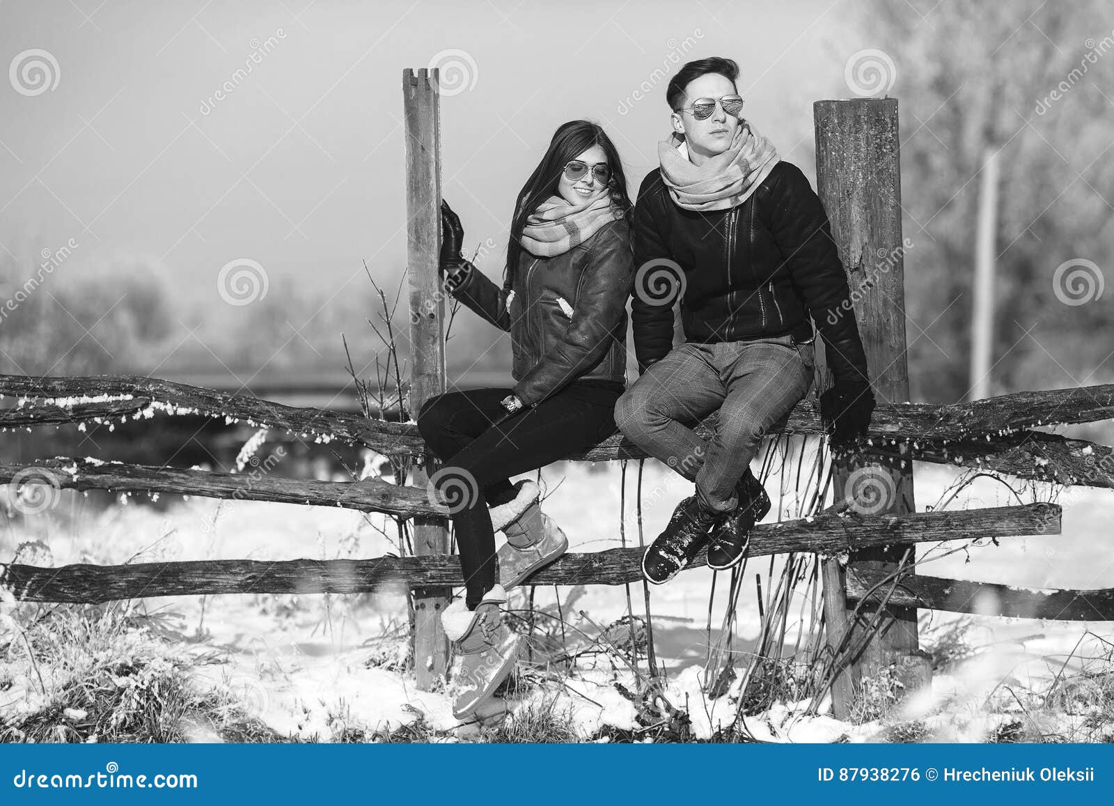 Young Couple Sitting on Old Fence Stock Photo - Image of nature, male ...