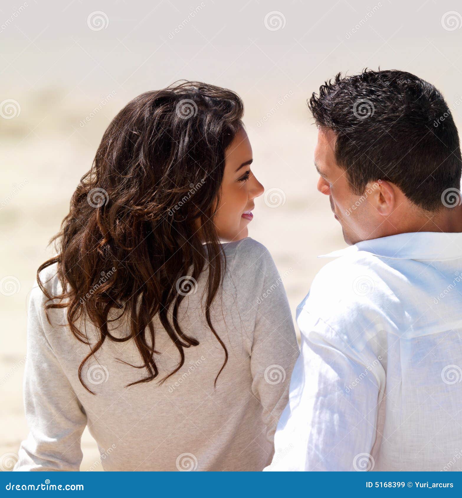 Young Couple Sitting Together Stock Image - Image of male, couple: 5168399