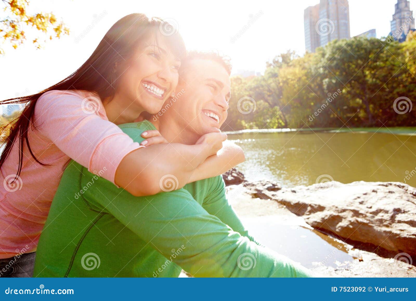Young Couple Sitting Together Outside Stock Photo - Image of nature ...