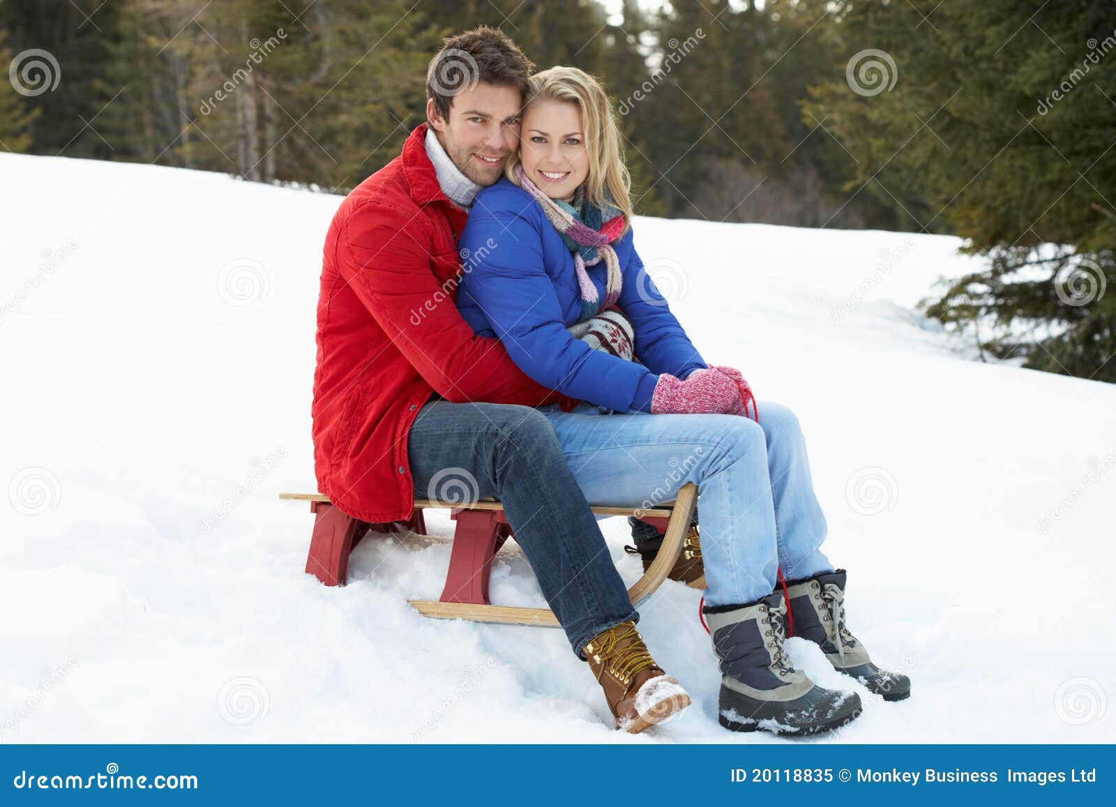 Young Couple on a Sled in Alpine Snow Scene Stock Image - Image of ...