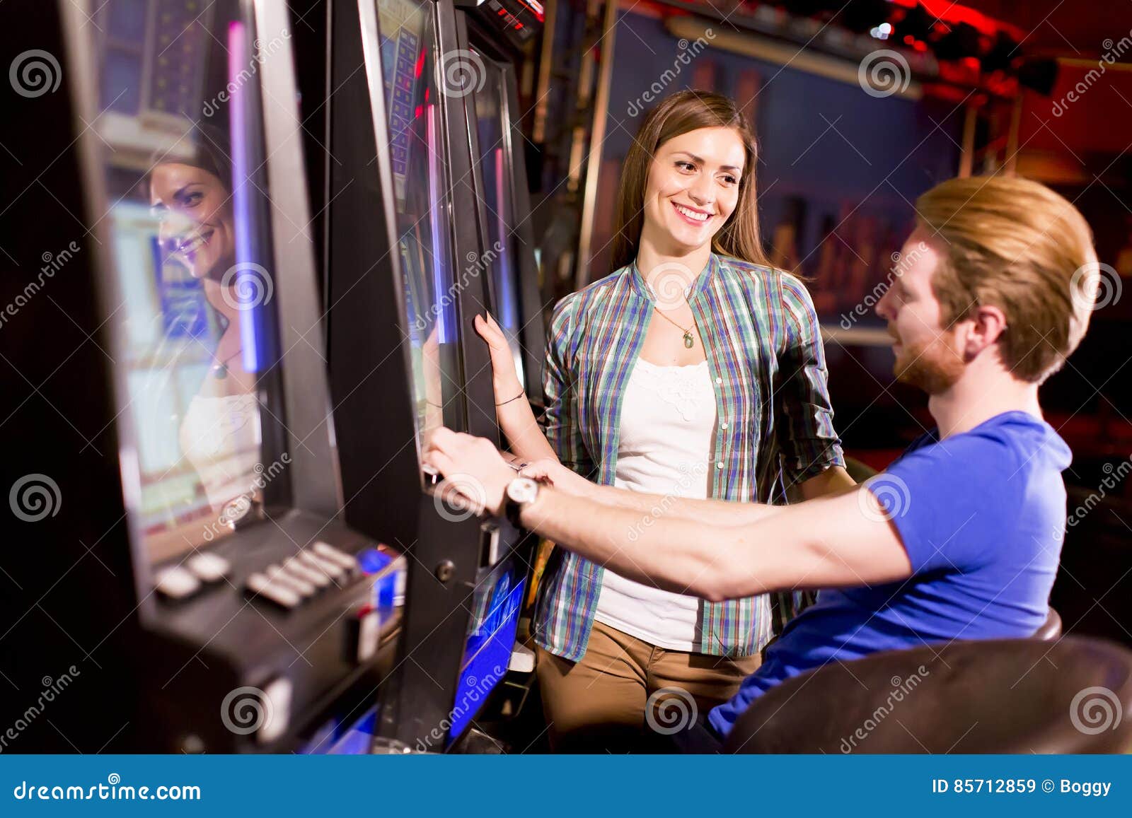 Young Couple on Slot Machine in the Casino Stock Image - Image of lucky ...