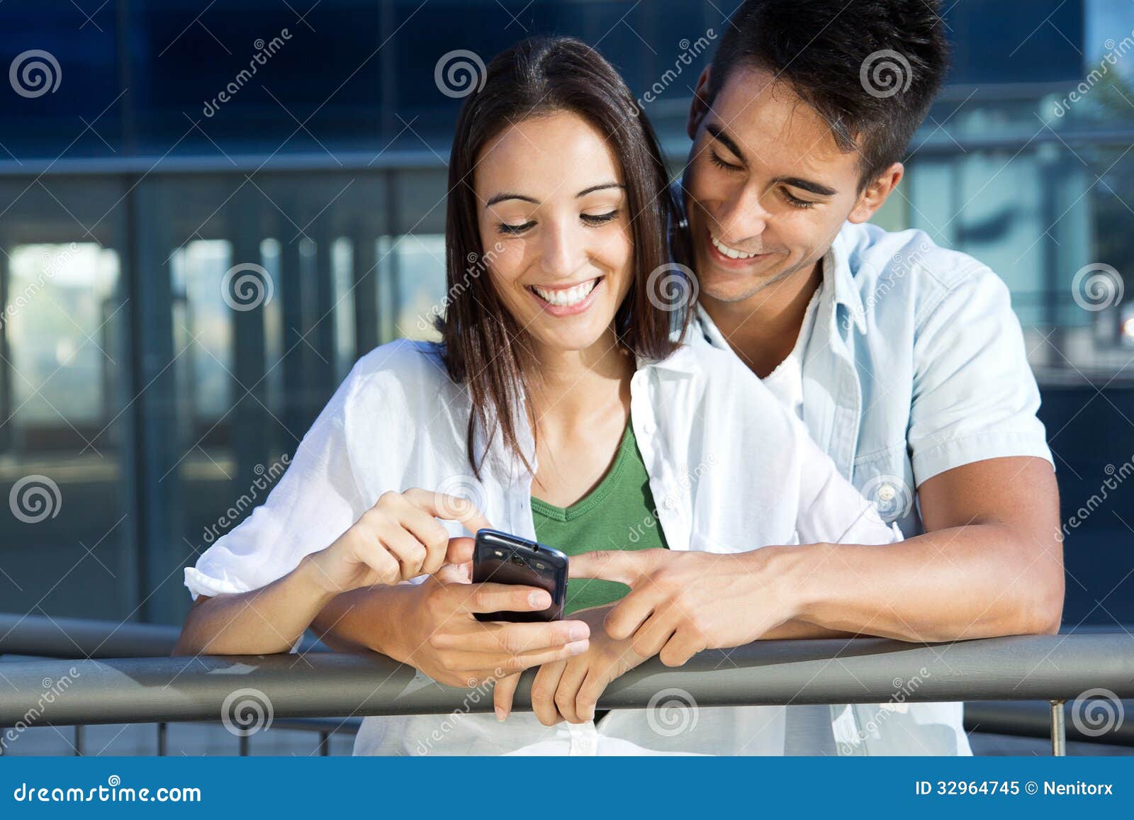 Young Couple with Smart Phone Stock Image - Image of mobile, chatting ...