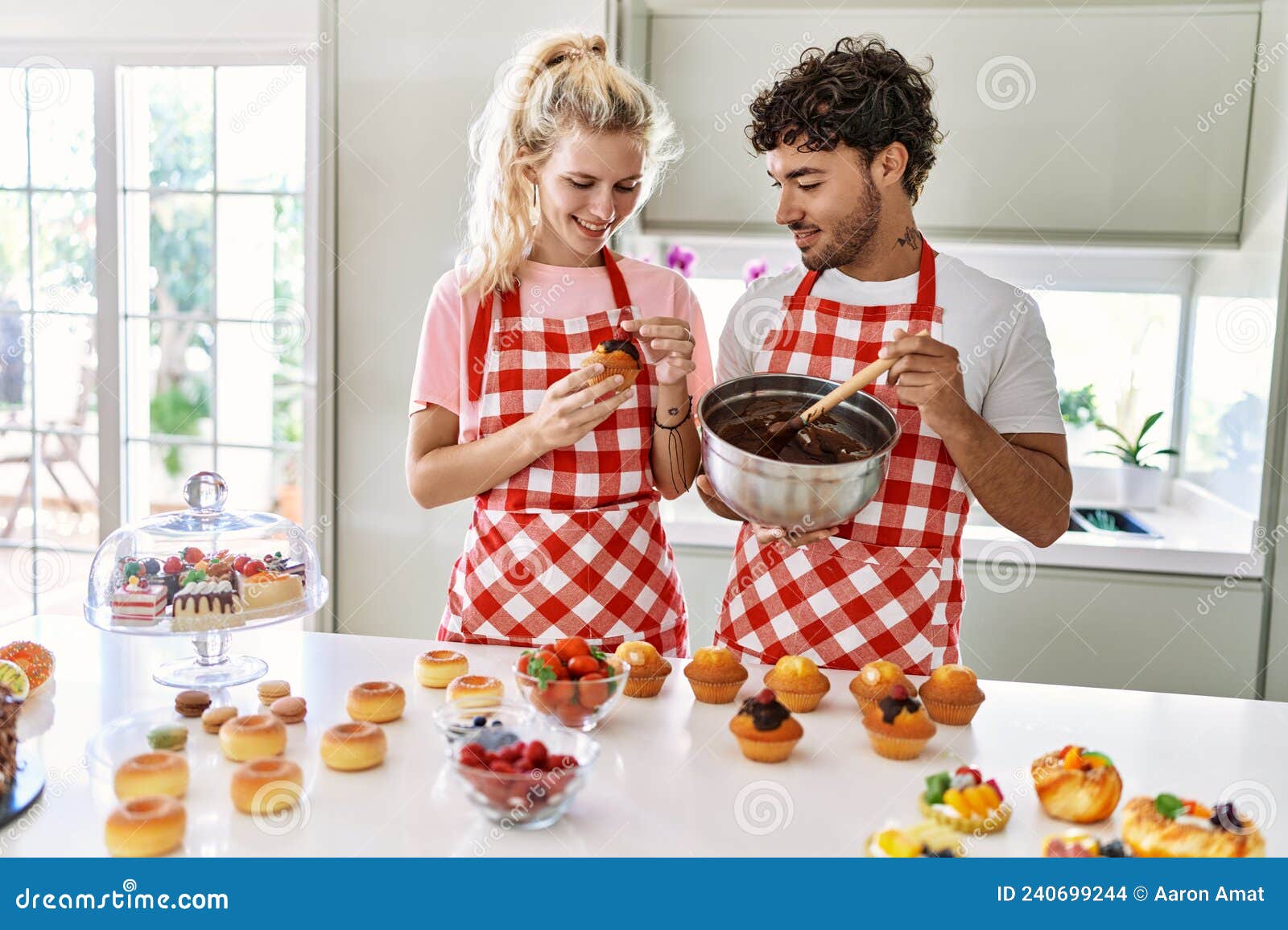 Young Couple Smiling Happy Cooking Sweets at Kitchen Stock Photo ...