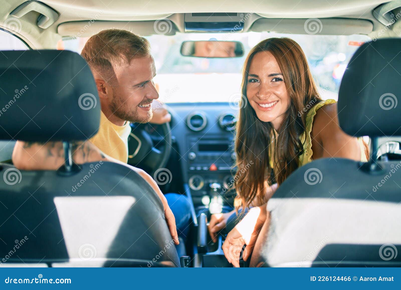 Young Couple Smiling Happy Driving Car Stock Photo - Image of enjoy ...