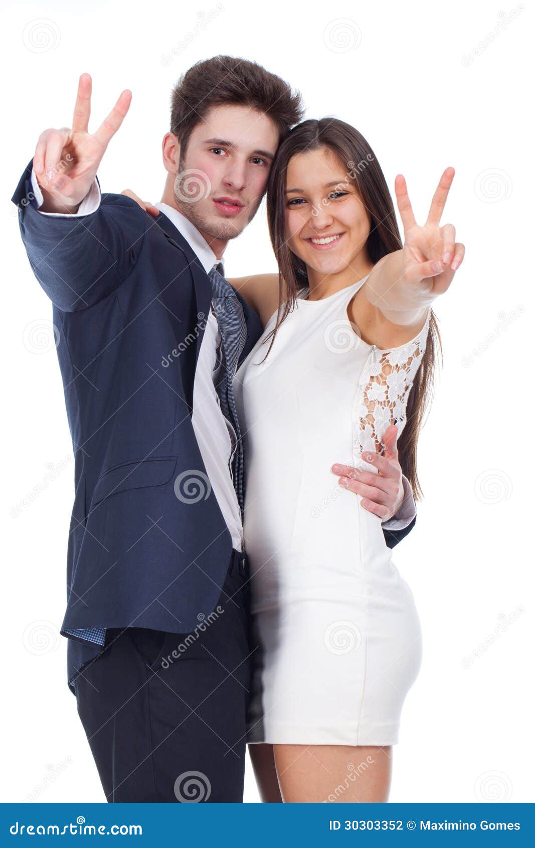 Young Couple Smiling with Victory Gesture Stock Photo - Image of ...