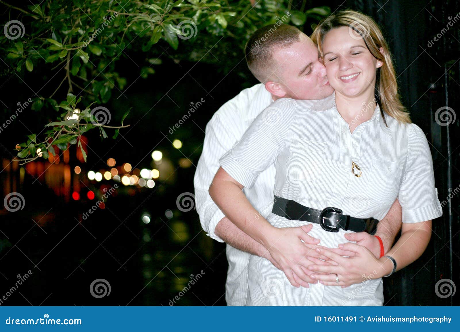 Young Couple Snuggling stock image. Image of beautiful - 16011491