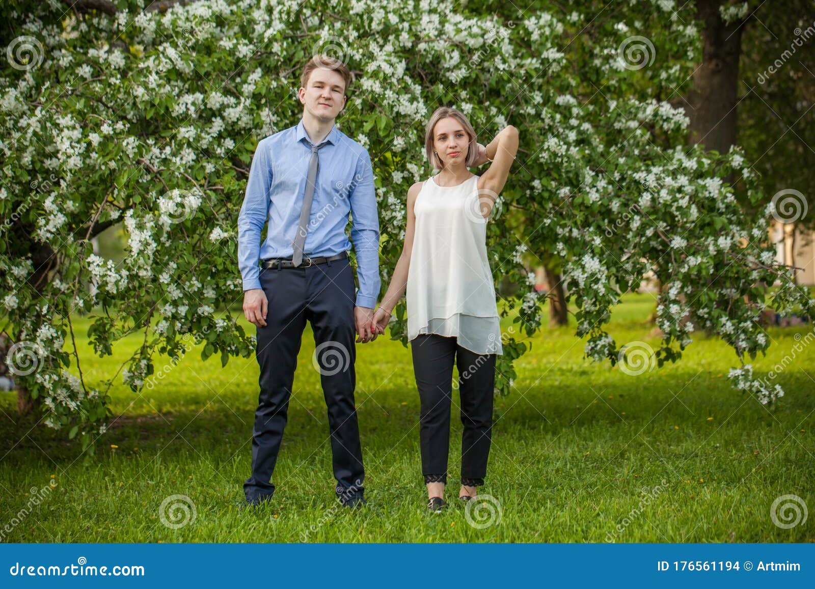 Young Couple in Spring Park Stock Photo - Image of boyfriend, cuddling ...