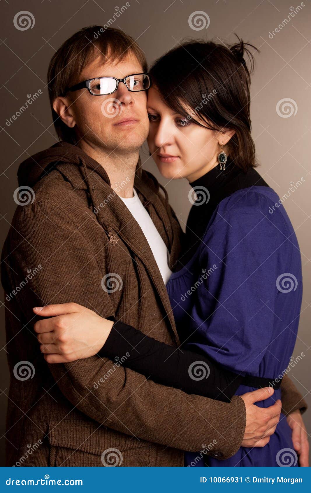 Young Couple Standing Embrace Stock Image - Image of forward, pocket ...