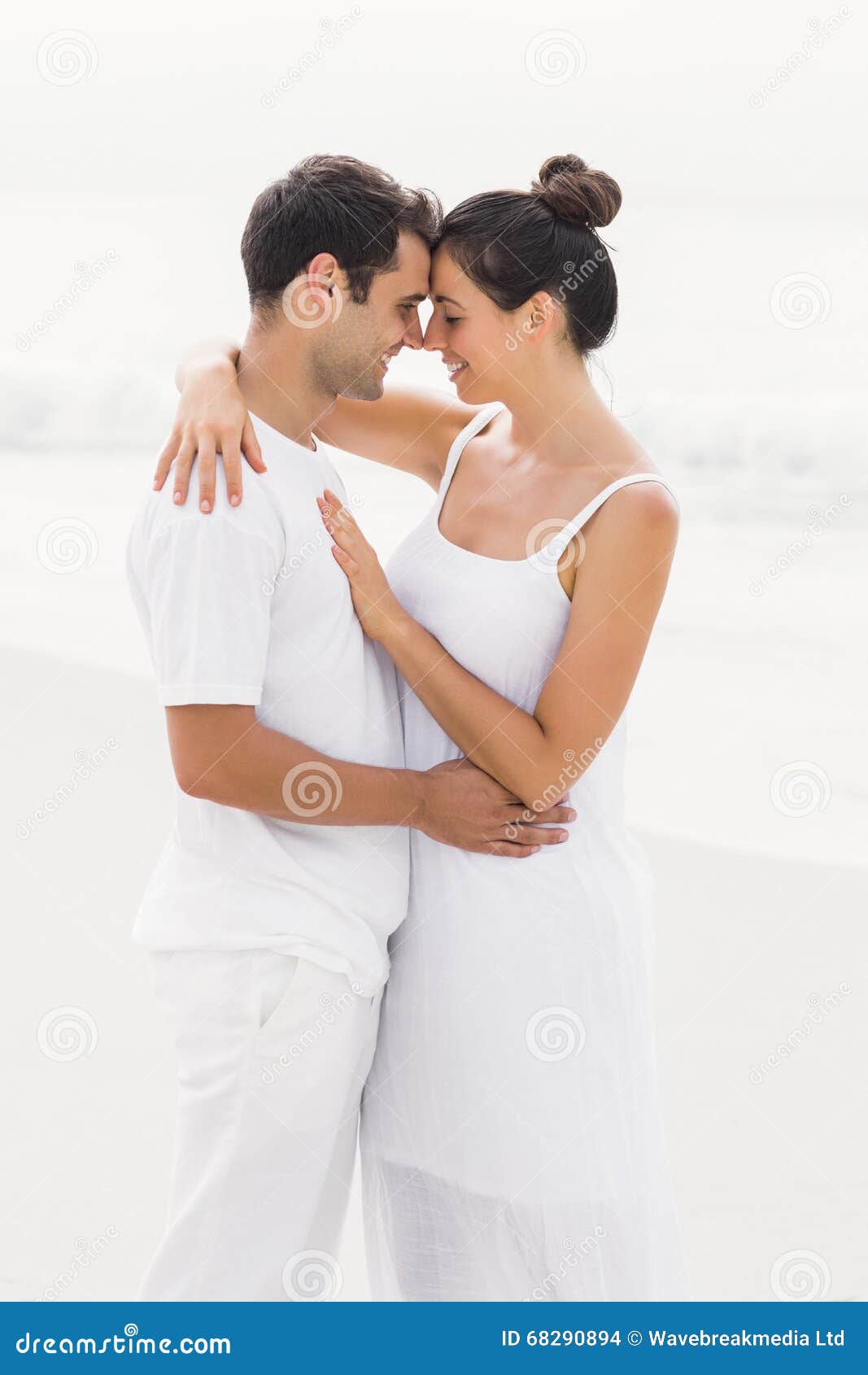 Young Couple Standing Face To Face and Romancing Stock Photo - Image of ...