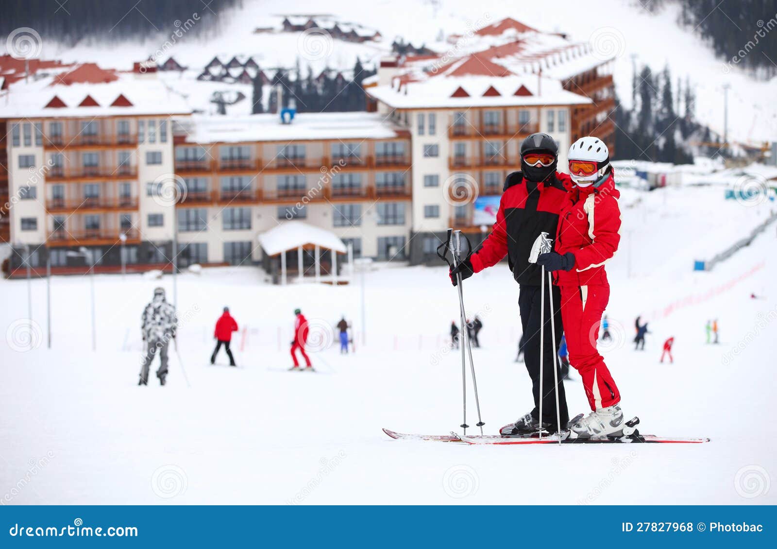 Young Couple Standing on a Ski Slope Stock Photo - Image of portrait ...