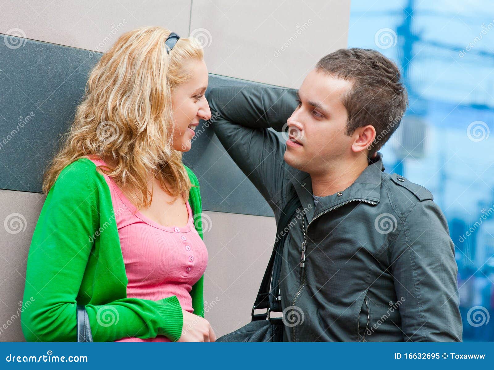 Young Couple Standing and Talking Stock Image - Image of friendship ...