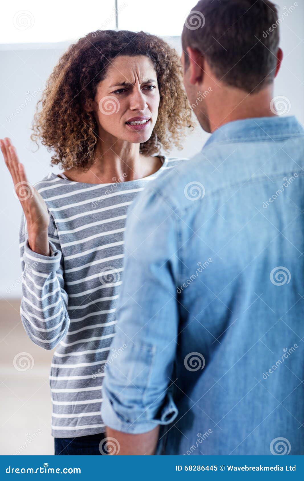 Young Couple Standing Together and Discussing after a Fight Stock Image ...