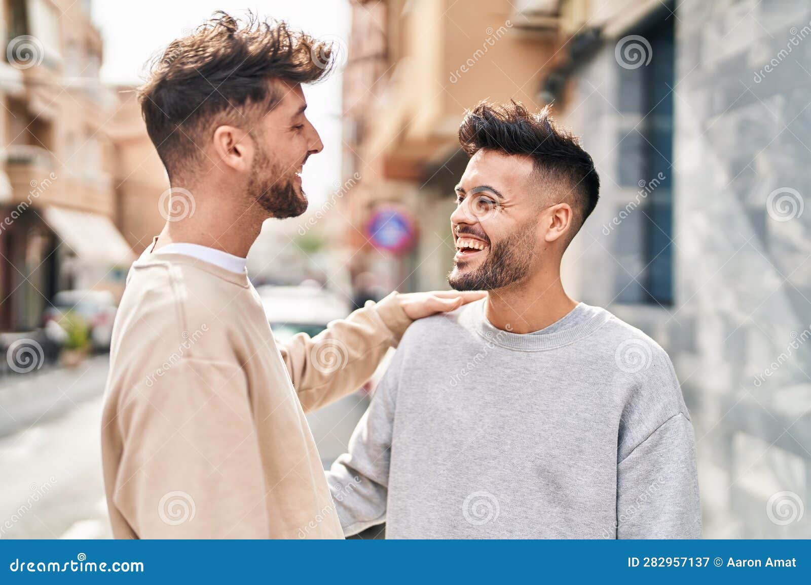 Young Couple Standing Together Speaking at Street Stock Image - Image ...