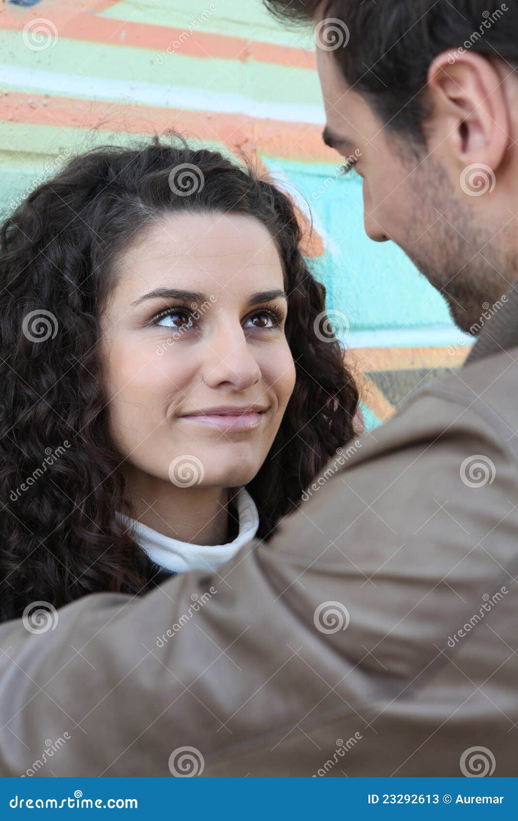 Young Couple Standing by Wall Stock Image - Image of adult, fianc: 23292613