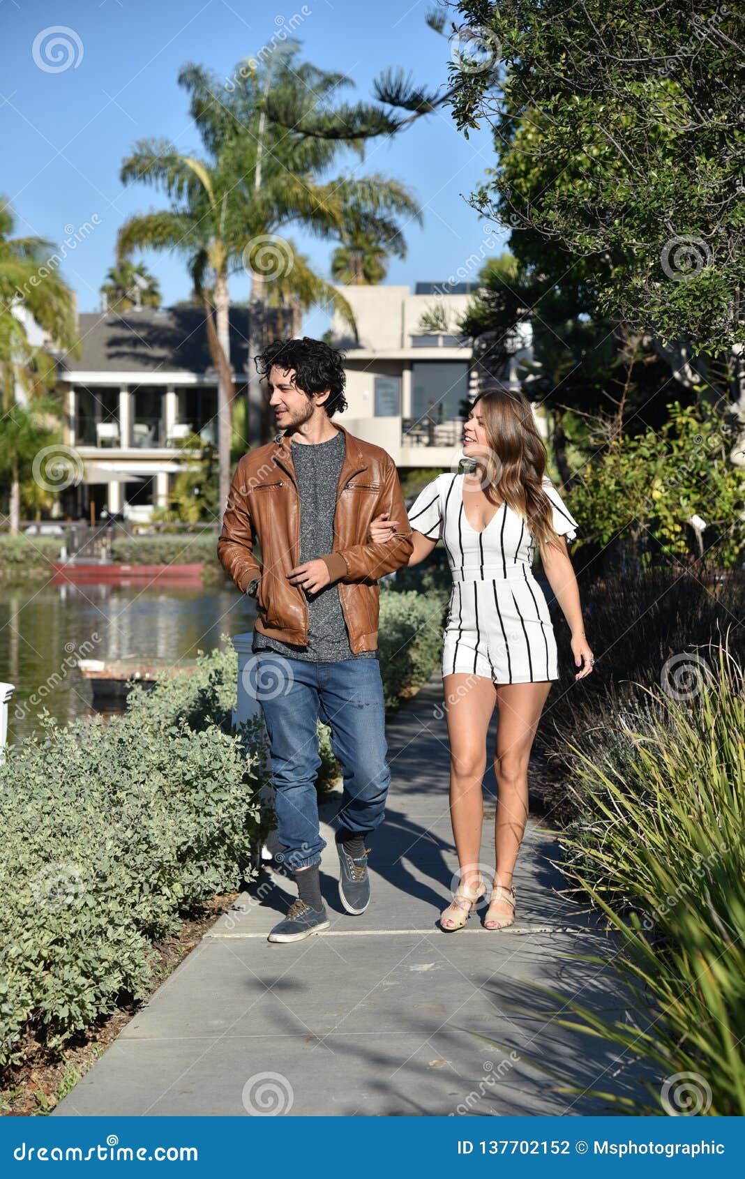 Young Couple Strolling through Beautiful Gardens Stock Photo - Image of ...