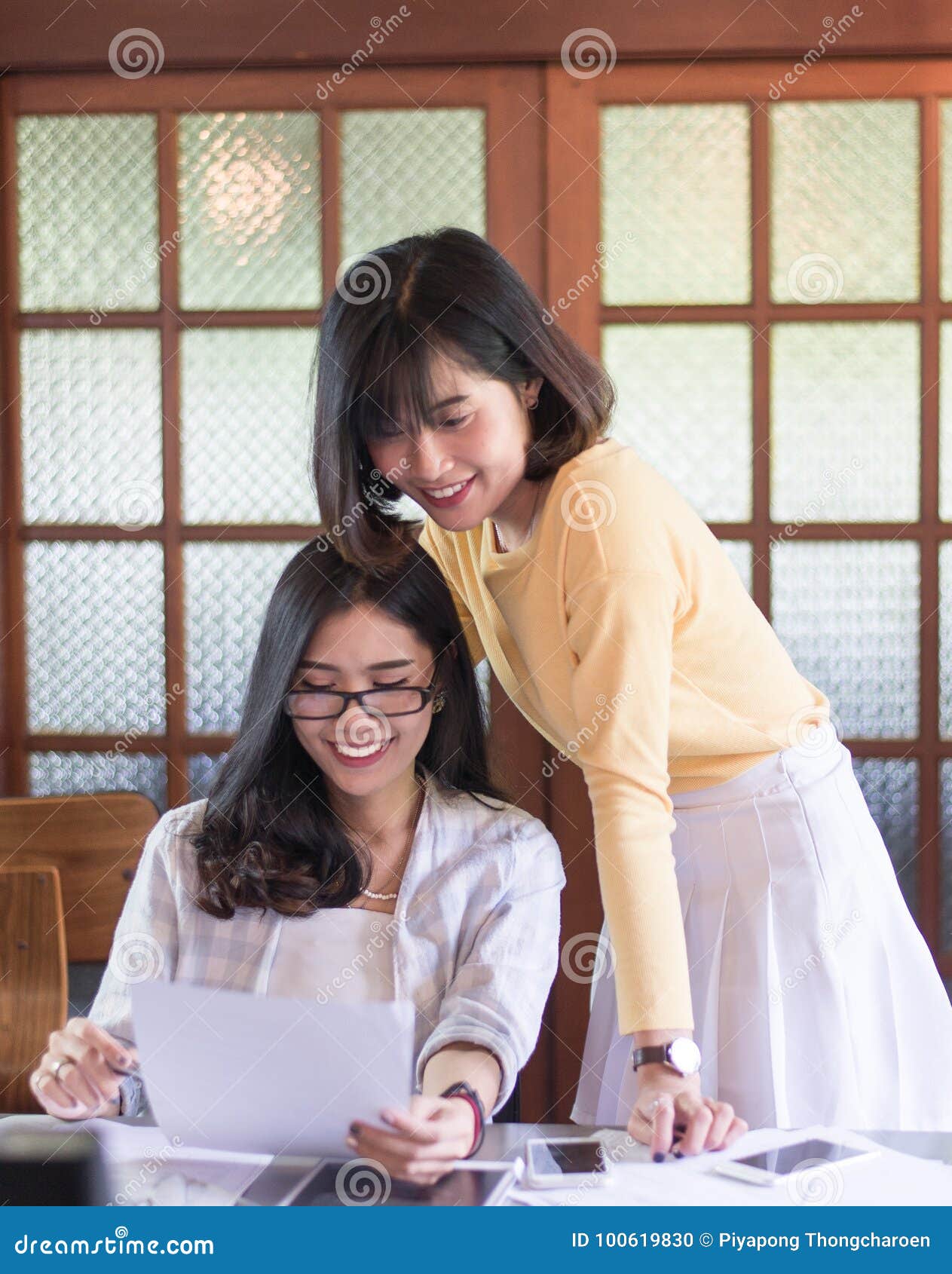 Young Couple Student Discussing Things and Working on a Project Stock ...