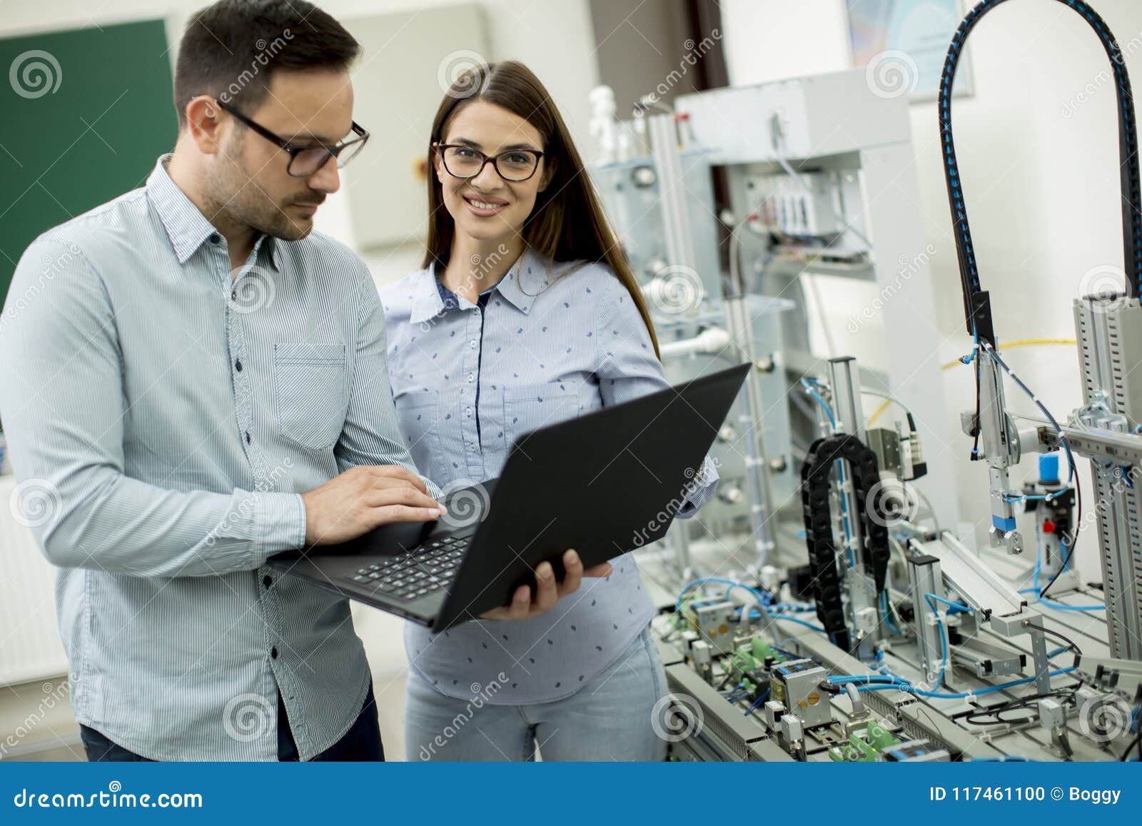 Young Couple of Students at Robotics Lab Stock Photo - Image of ...