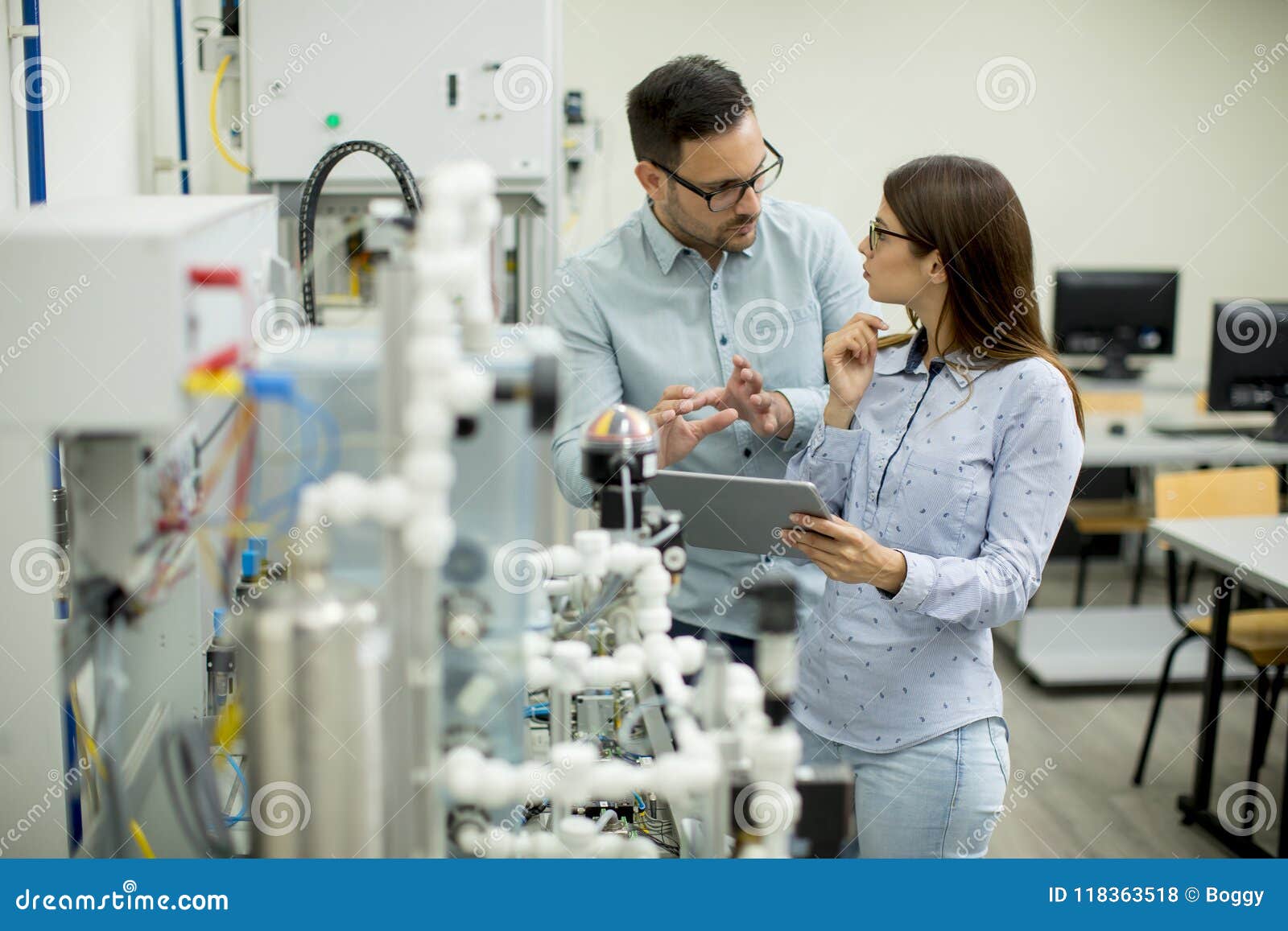 Young Couple of Students at Robotics Lab Stock Photo - Image of ...