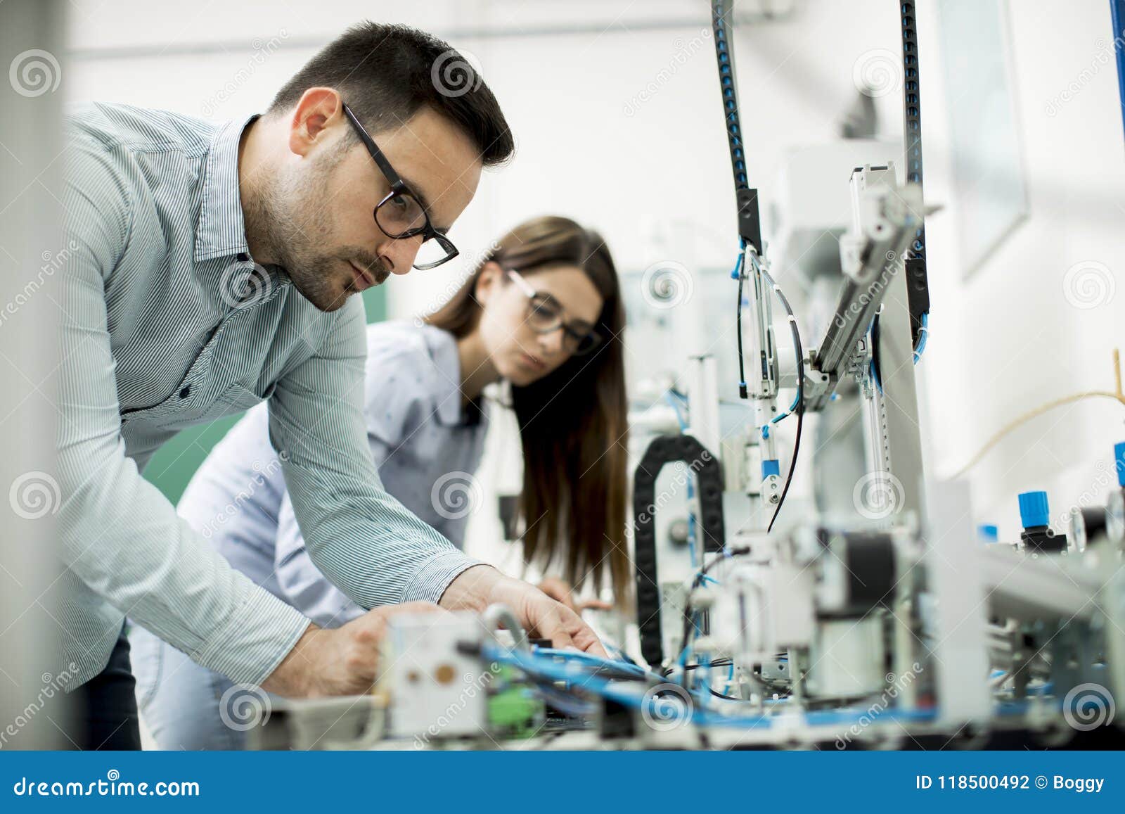 Young Couple of Students at Robotics Lab Stock Photo - Image of ...