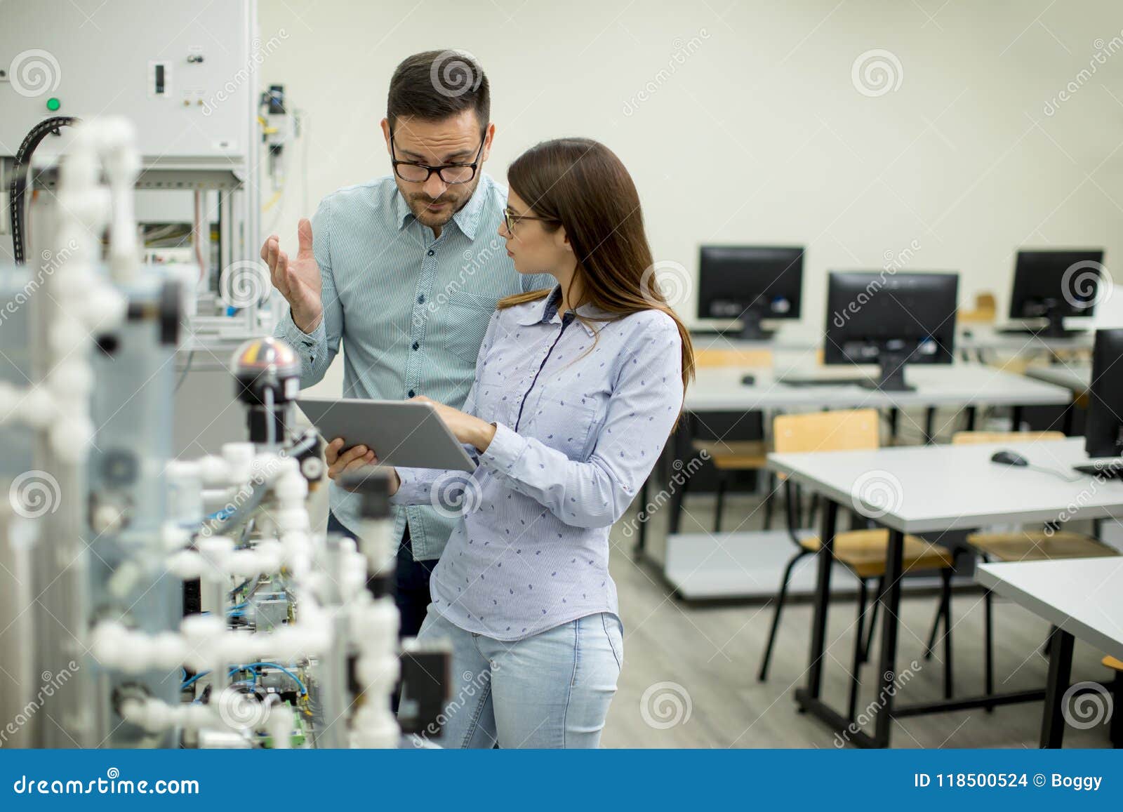 Young Couple of Students at Robotics Lab Stock Photo - Image of ...