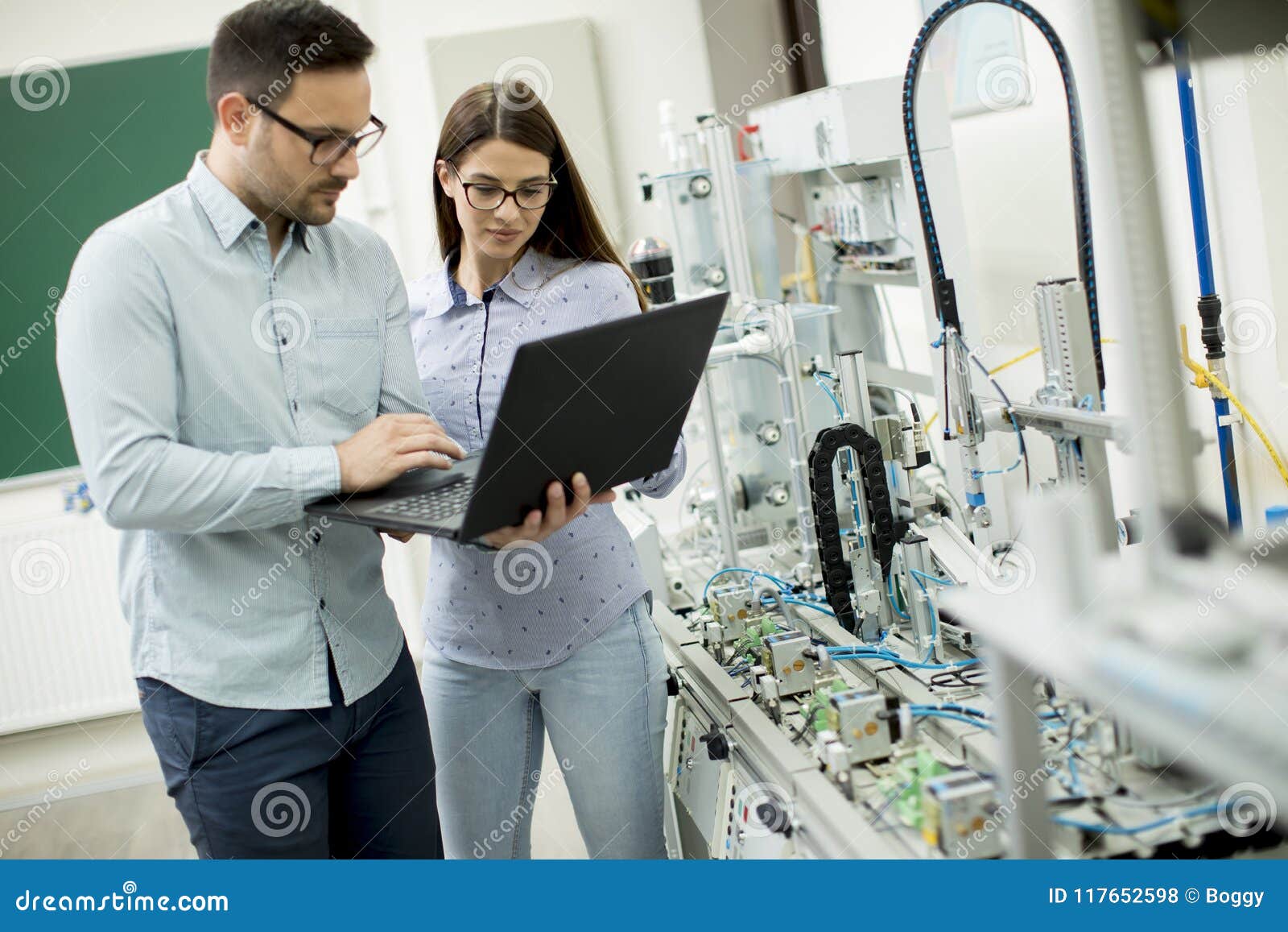 Young Couple of Students at Robotics Lab Stock Photo - Image of ...