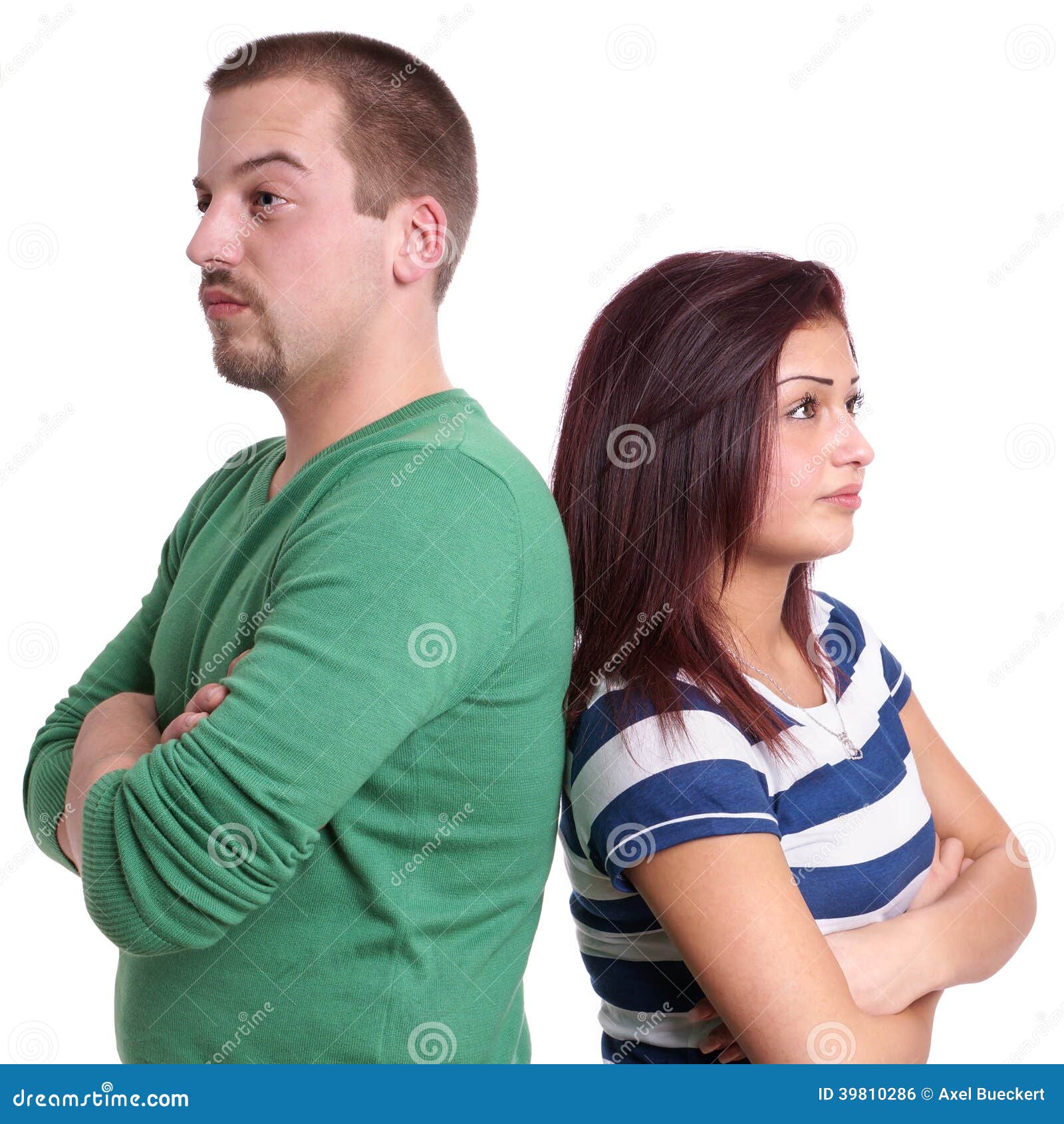Couple Sulking Each Other Sitting Back To Back On Bed Royalty-Free ...