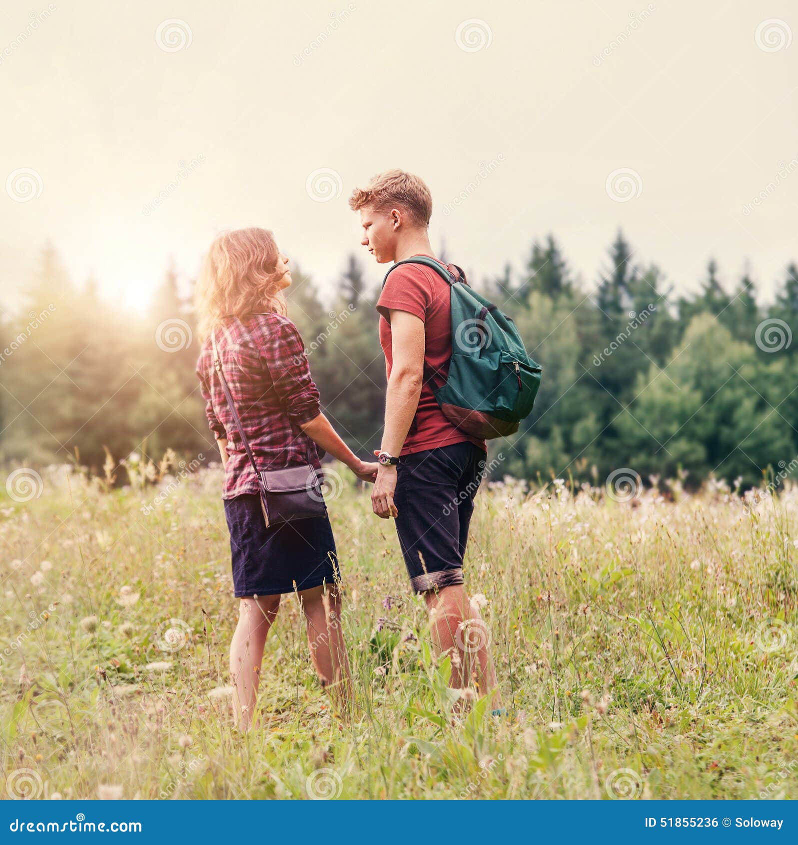 Young Couple at Sunset Time on Forest Walk Stock Photo - Image of ...