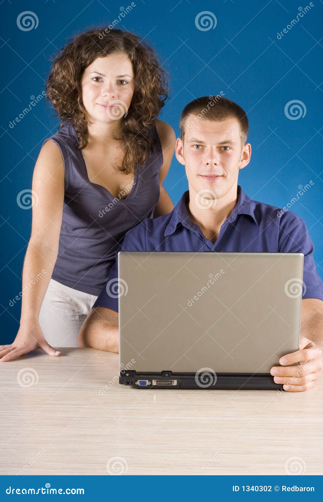 Young Couple at the Table with Laptop Stock Photo - Image of character ...