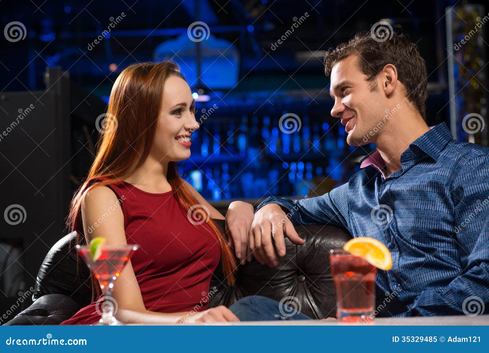 Young Couple Talking in a Nightclub Stock Image - Image of elegant ...