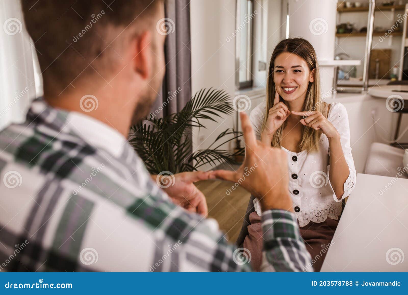Couple Talking Using Sign Language at Home Stock Photo - Image of ...